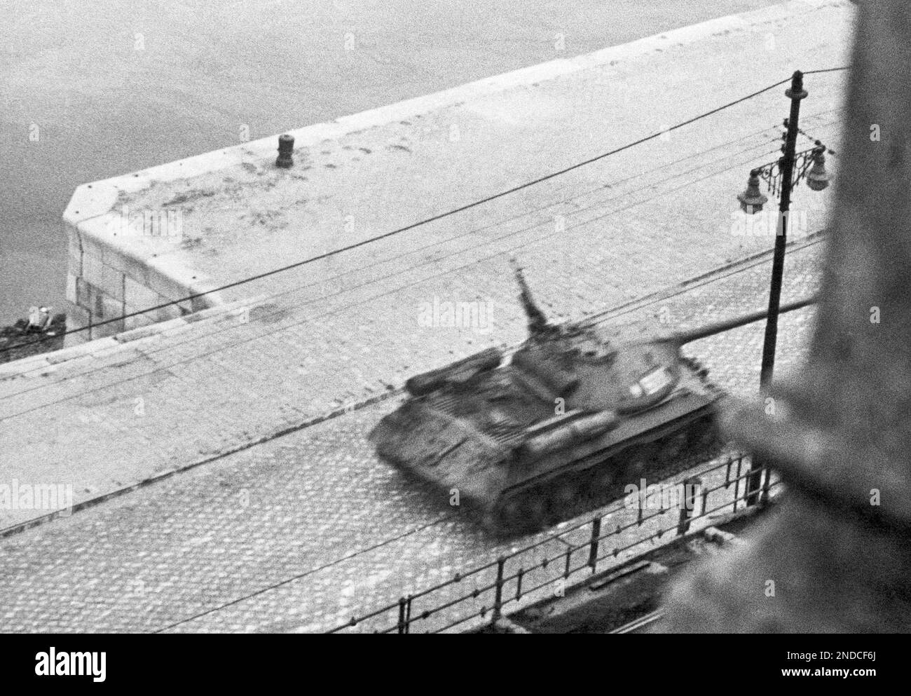 Anti-Soviet Hungarian rebels ride atop captured tank through Budapest ...