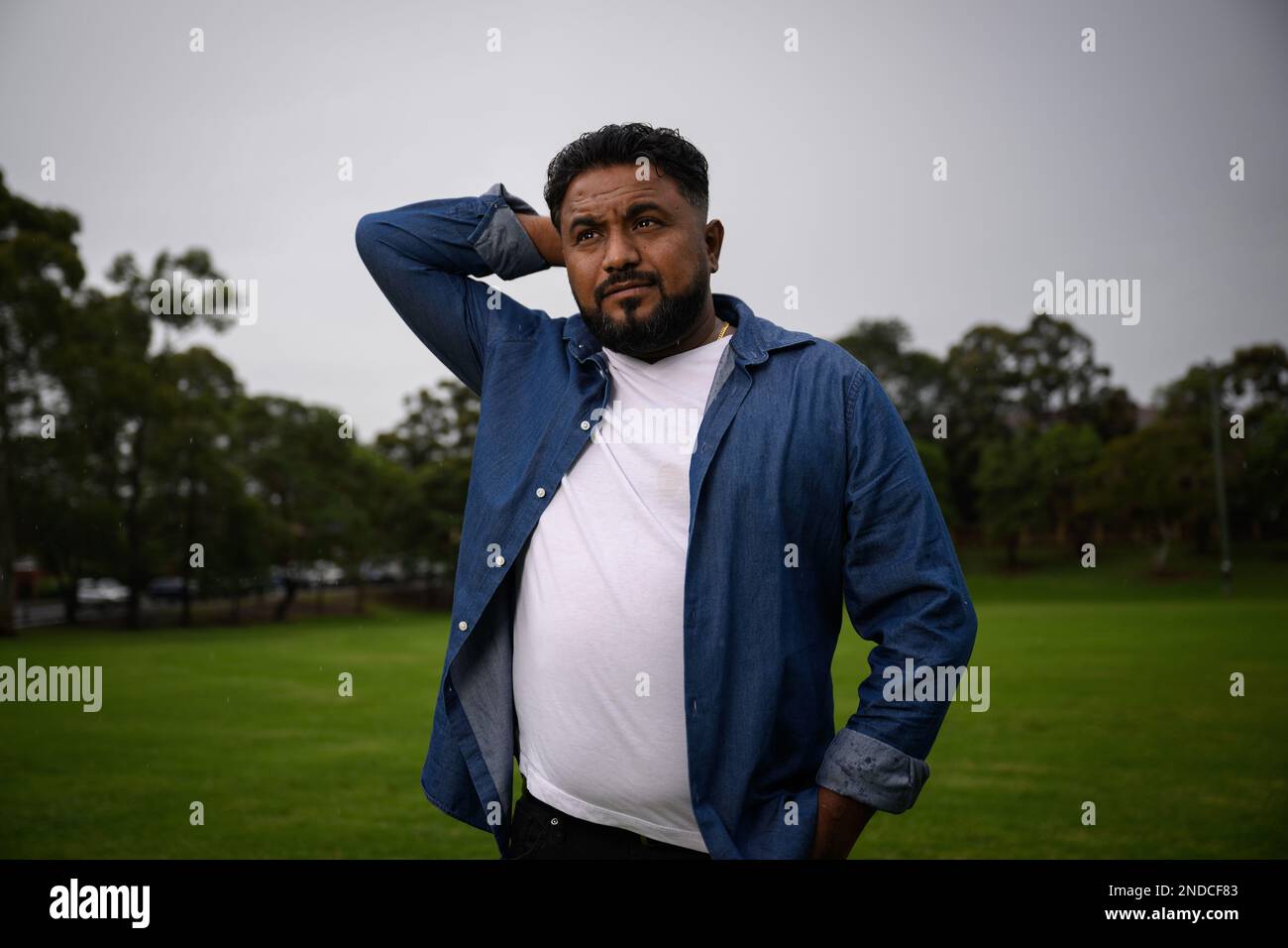 Iraqi refugee Ali Matar poses for a photograph, in Sydney, Tuesday ...