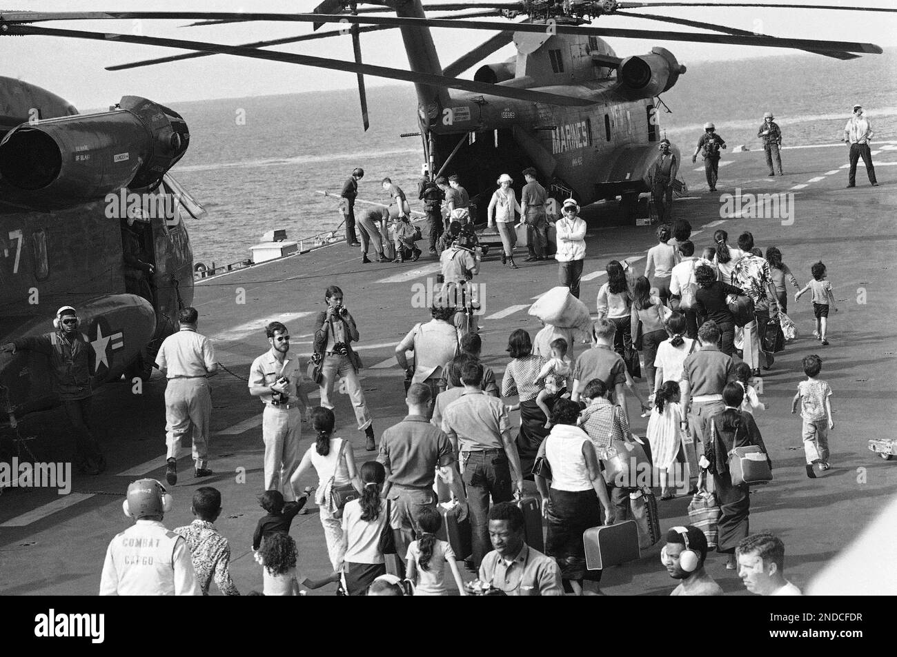 U.S. Embassy employees and Cambodian Nationals evacuated from Phnom ...