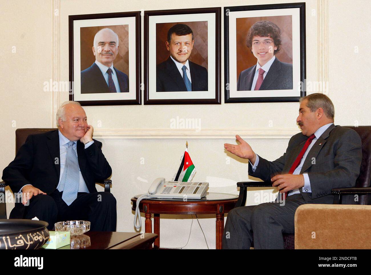 Jordanian Foreign Minister Nasser Judeh, right, speaks with his Spanish ...