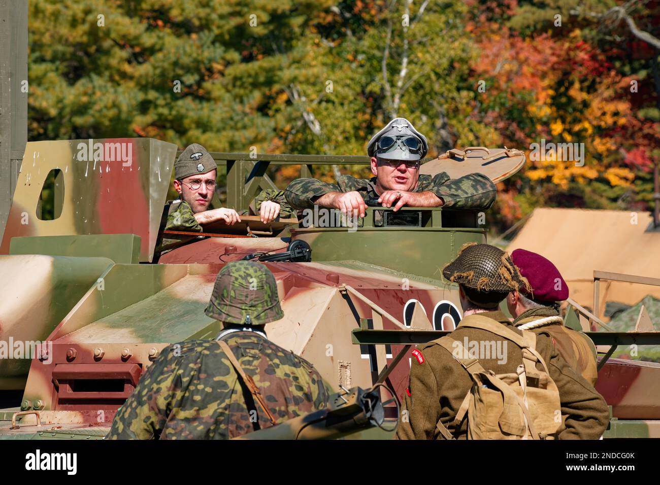 A WWII German camp is captured by the Americans during a reenactment at ...