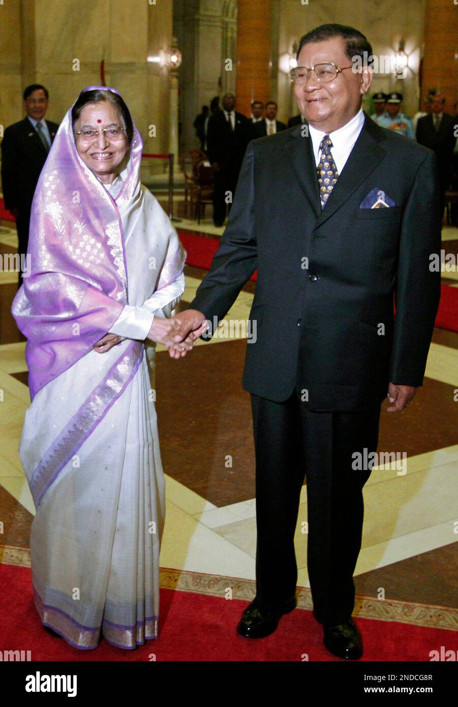 Myanmar's top military general, Senior Gen. Than Shwe, right, and ...