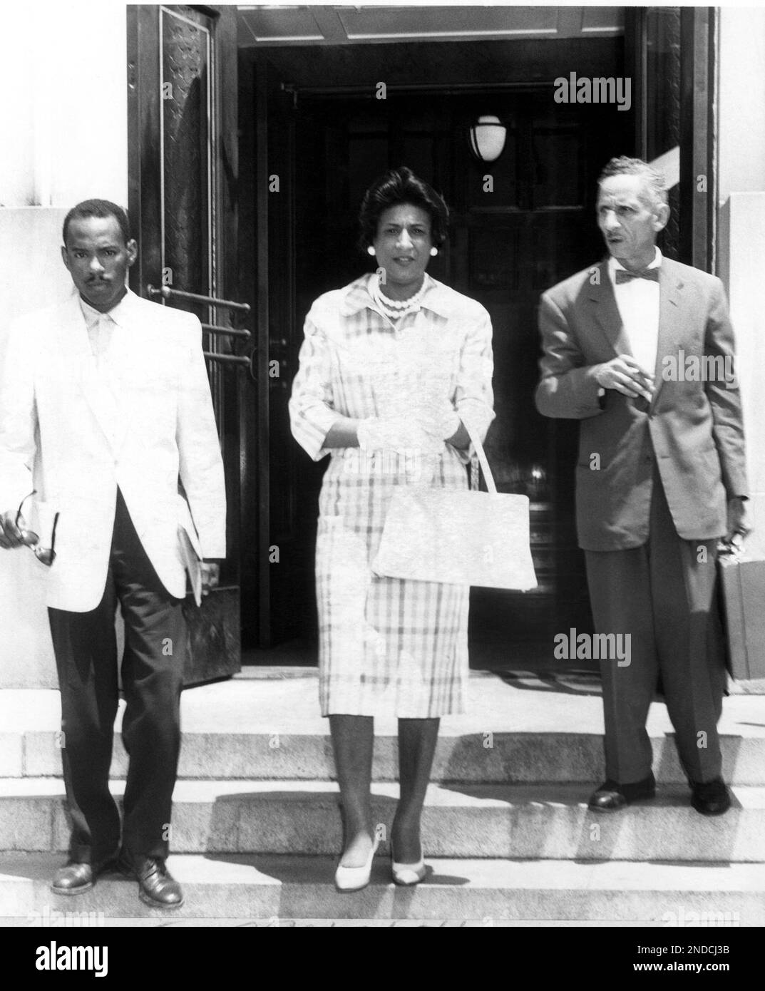 James H. Meredith, 28, left, leaves the courthouse with his attorneys ...