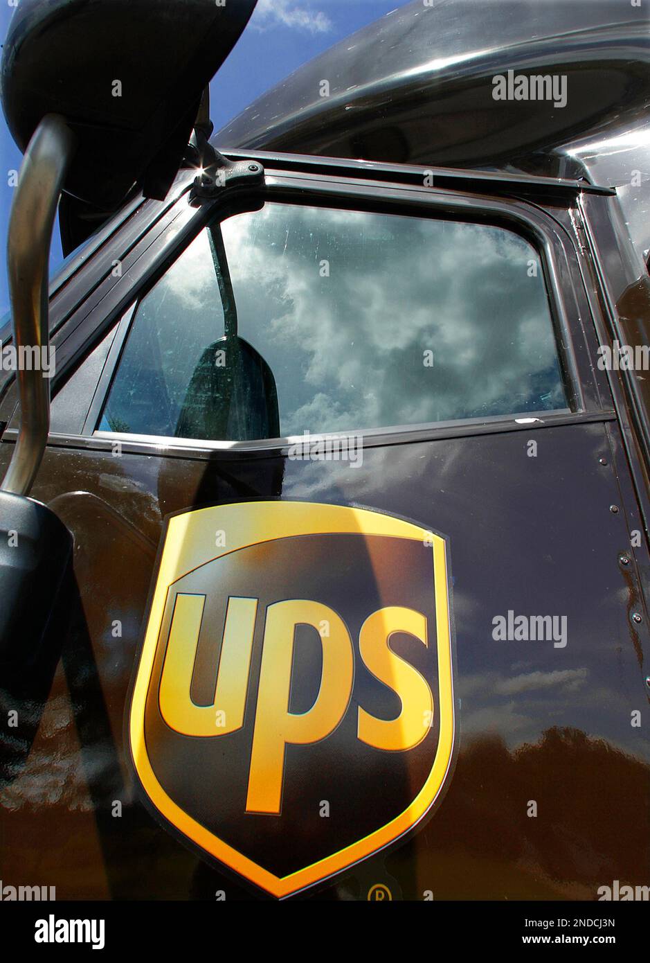 The UPS logo is seen on a delivery truck in Springfield, Ill., Tuesday ...
