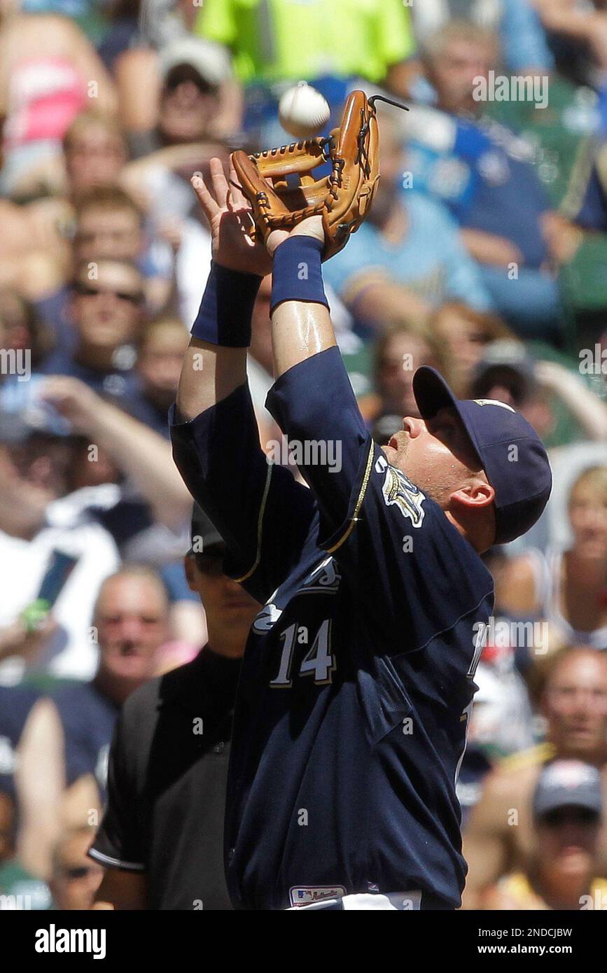 Milwaukee Brewers third baseman Casey McGehee makes a catch during the ...