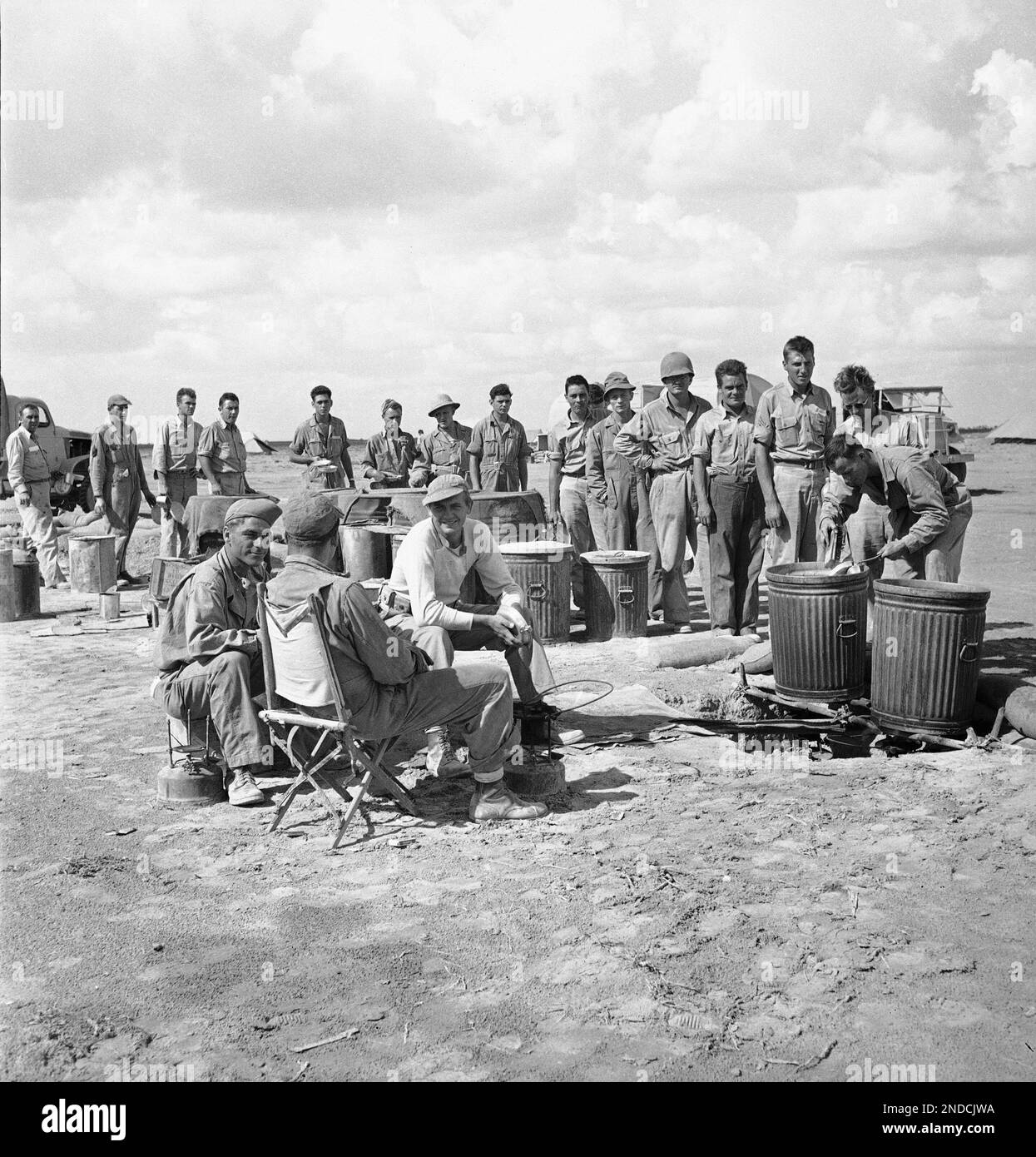 Officers line up for chow at USAAF Bomber Squadron in Western Desert of ...