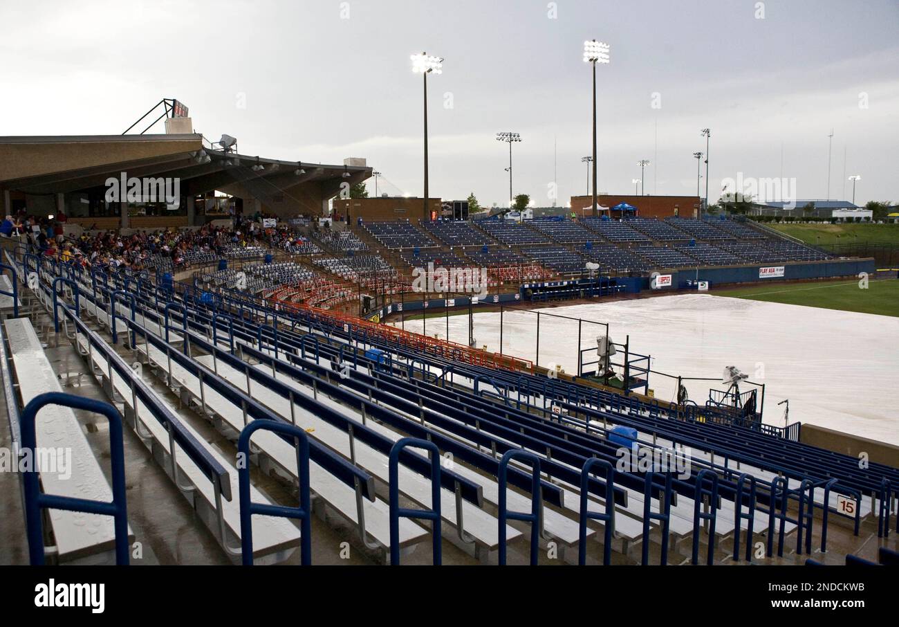 Tarp covers the infield during a rain delay during the World Cup of ...