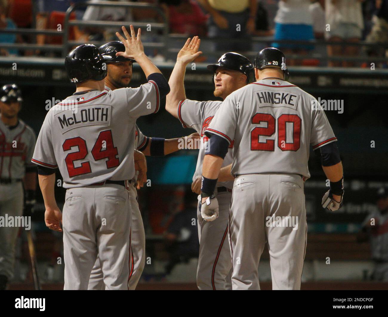 Atlanta Braves players Nate McLouth (24) and Eric Hinske (20) celebrate ...