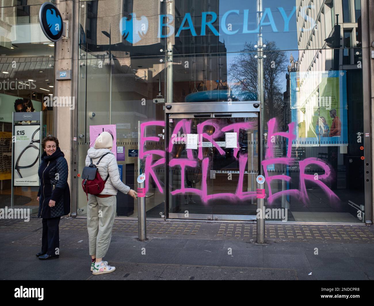 Climate Change campaigners paint 'Earth Killer' Graffiti on Barclays ...