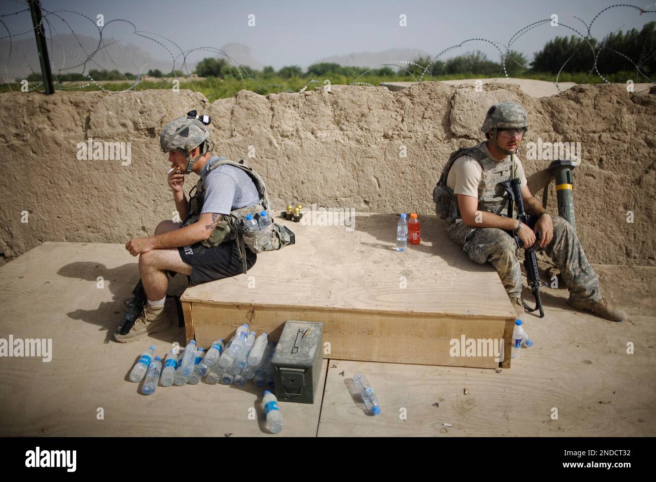 U.S. Army soldiers of the 1-320th Alpha Battery, 2nd Brigade of the ...