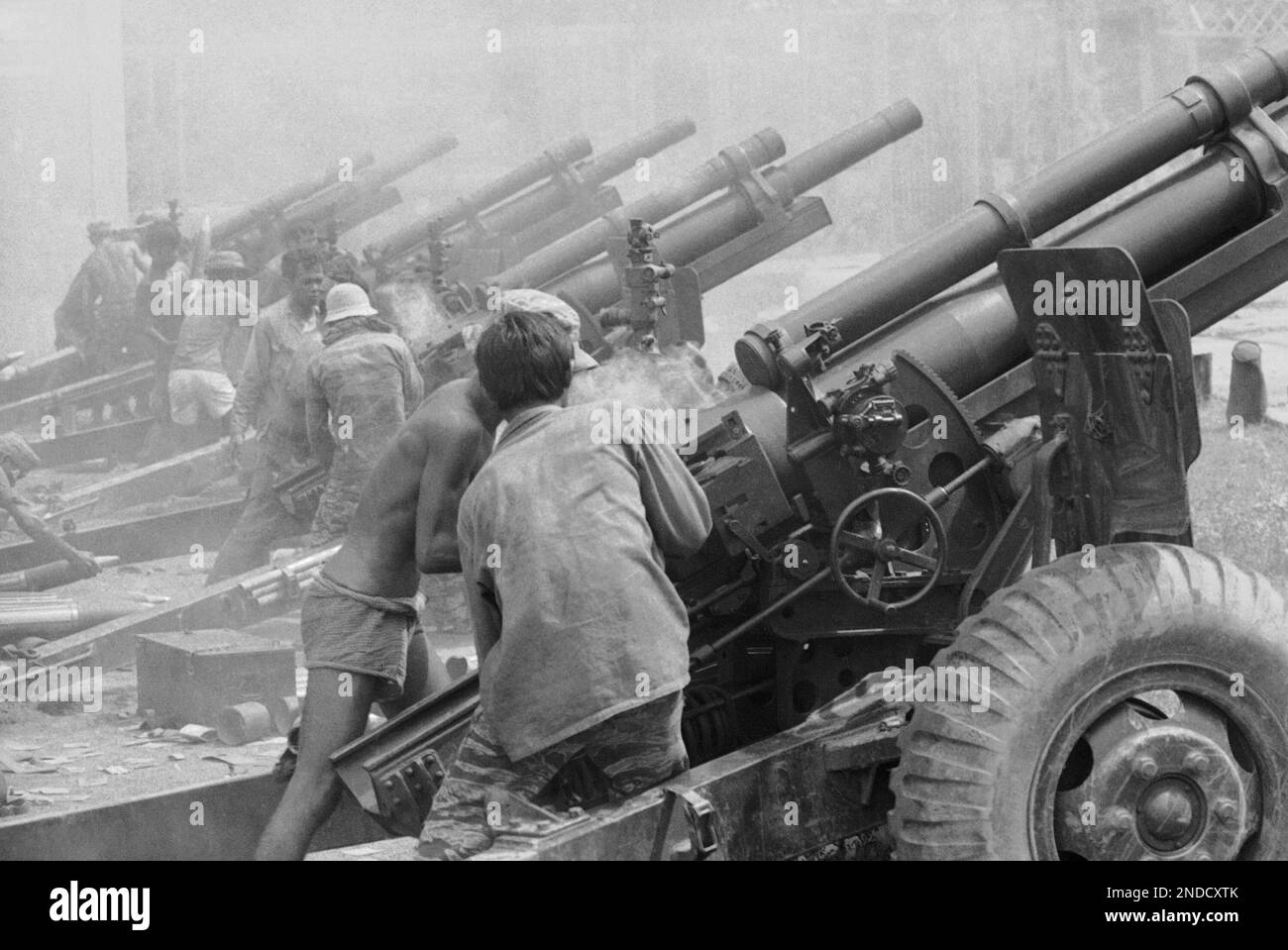 Cambodian artillerymen man a battery of 105mm howitzers on Route 4 ...
