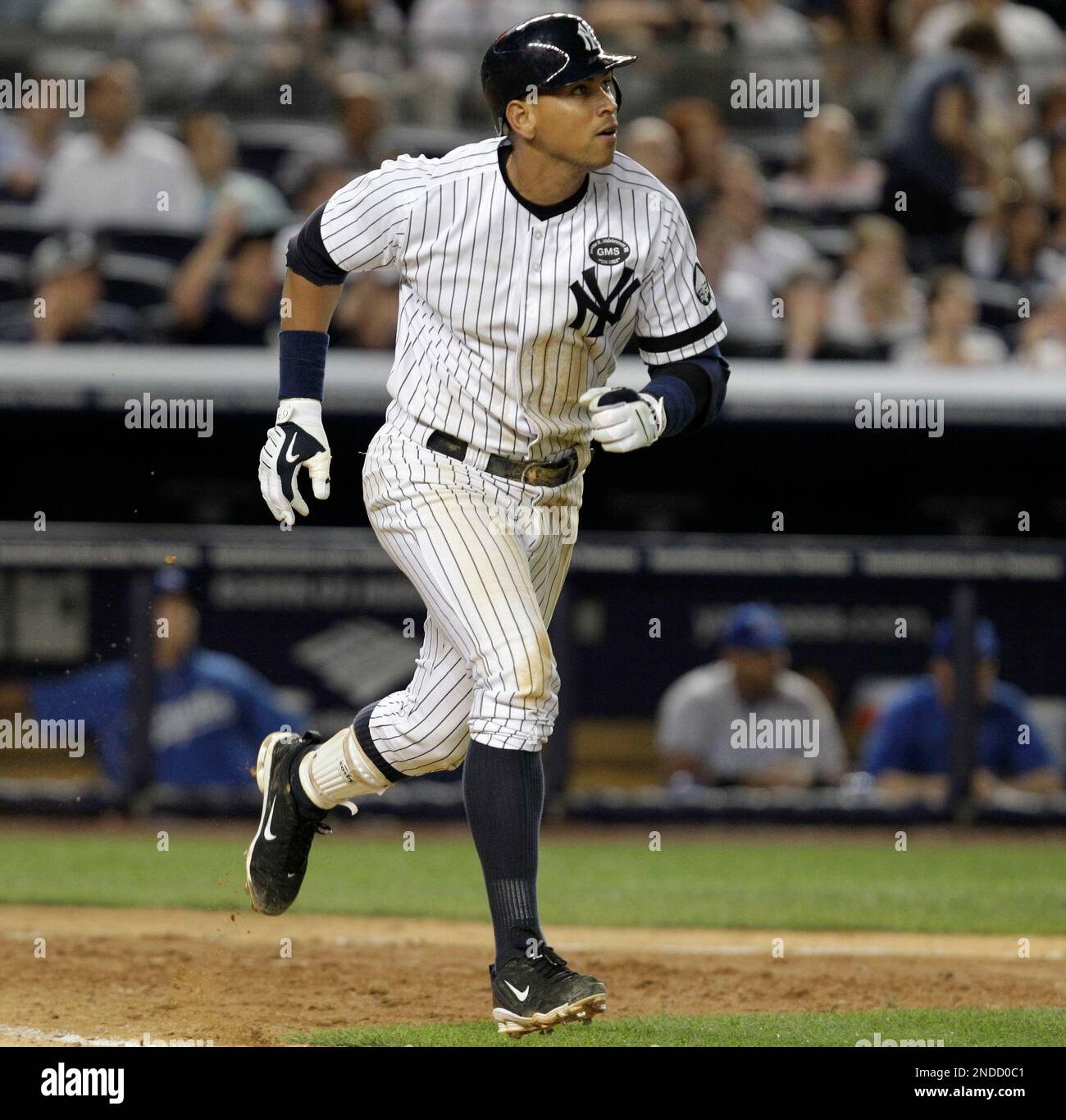 New York Yankees Alex Rodriguez runs the bases watching his 599th home ...