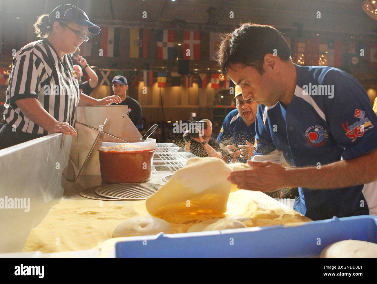 Judge Lori Starr watches as Pali Grewal competes in the Domino's ...