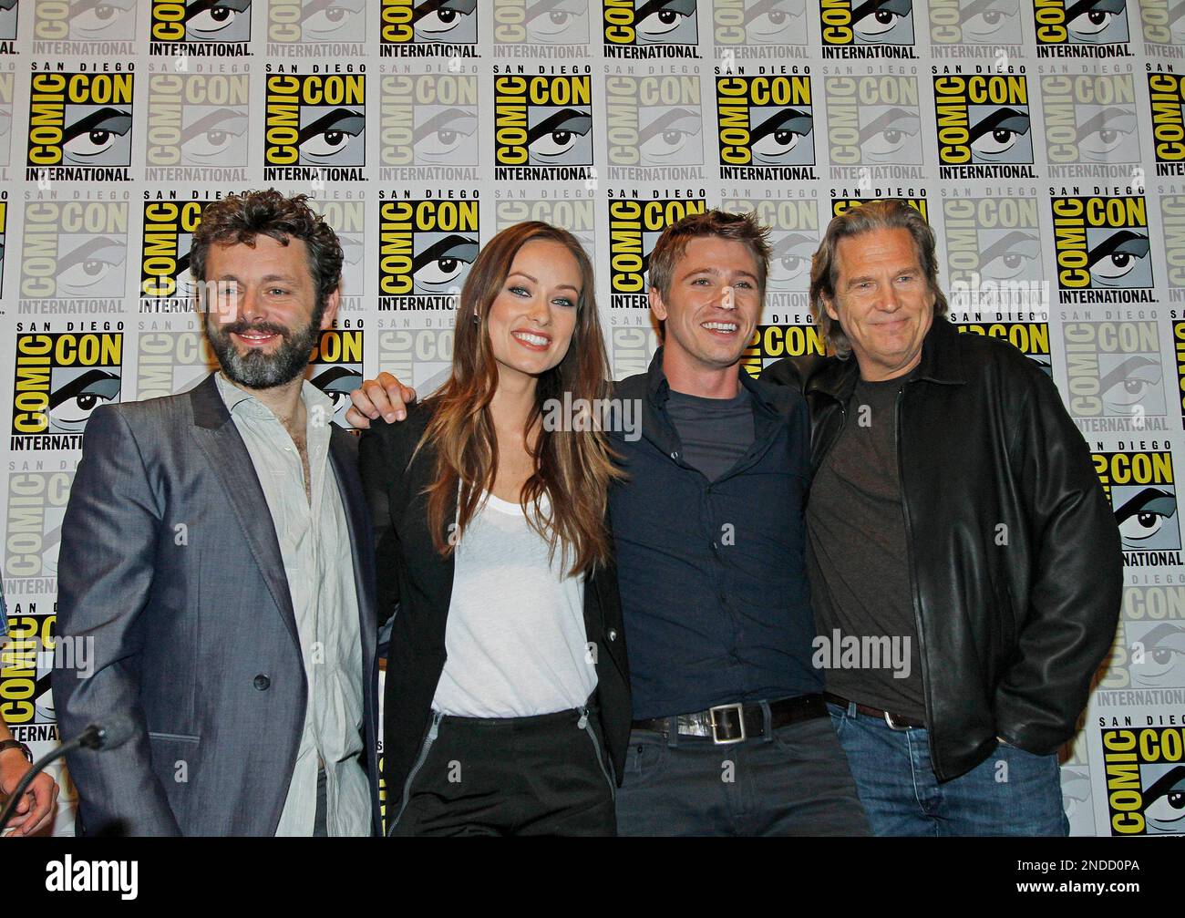 Cast members of the movie "Tron" from left, Michael Sheen, Olivia Wilde ...