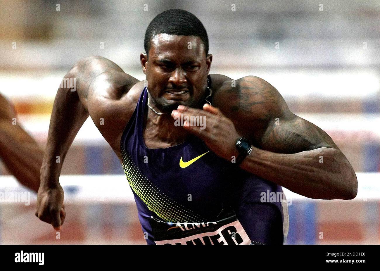U.S. athlete David Oliver competes to win the Men's 110m hurdles race ...