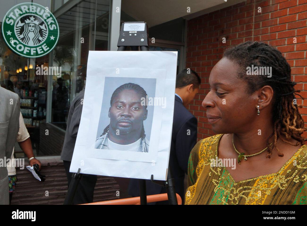 Los Angeles Police Department detective Venus Mason, right, looks at ...