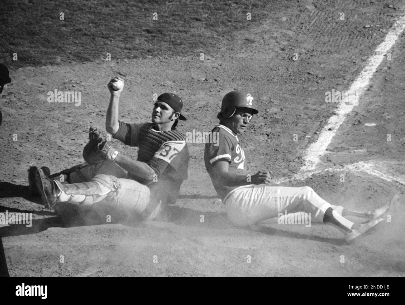 Pan American catcher John Nickerson (37) holds up the ball for the ...