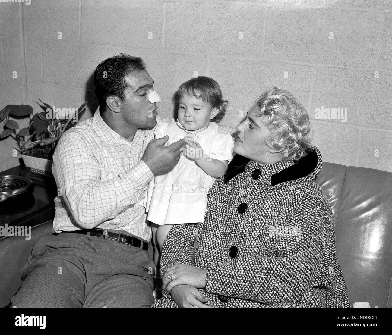 Rocky Marciano’s plastered beak doesn’t scare his wife, Barbara, but ...
