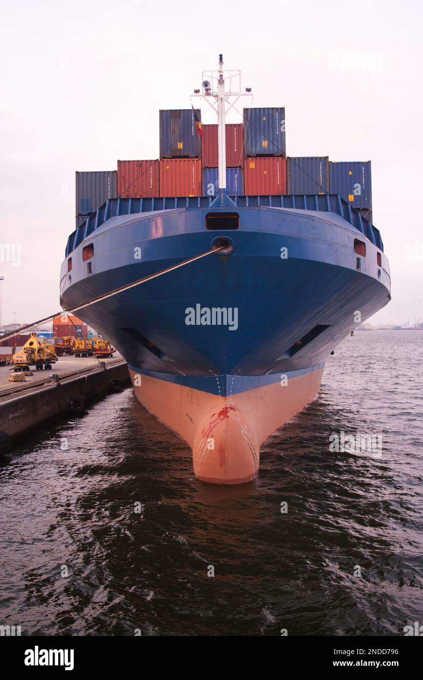 Front view of moored container ship loaded with shipping containers ...