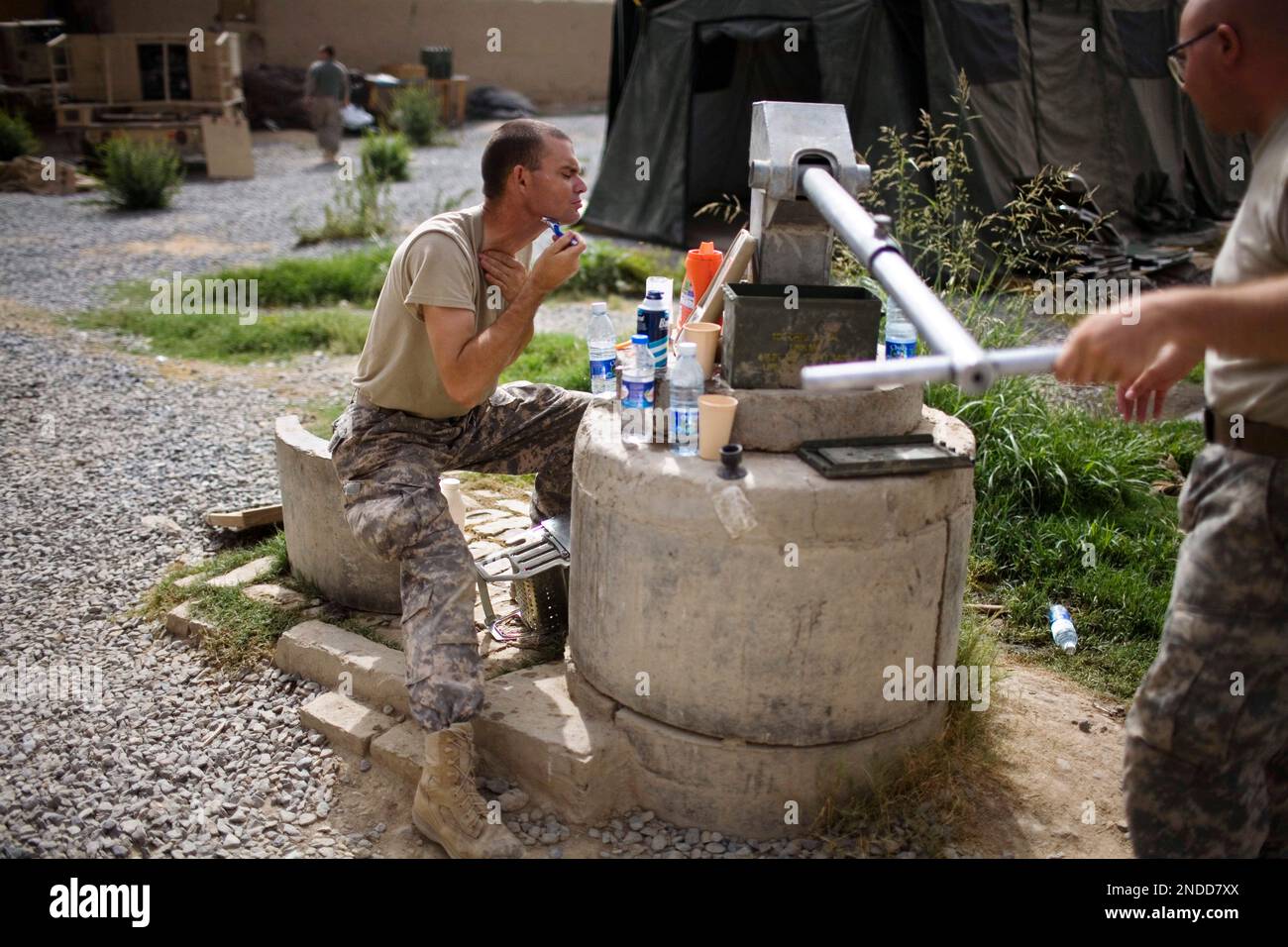 U.S. soldiers from the 1st Battalion, 320th Field Artillery Regiment ...