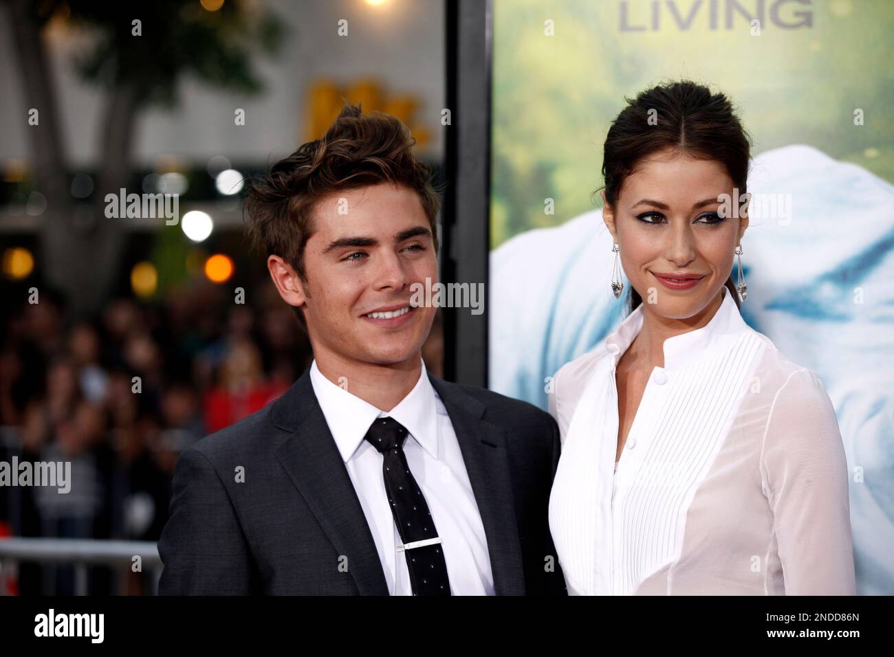 Cast members Zac Efron, left, and Amanda Crew pose together at the ...