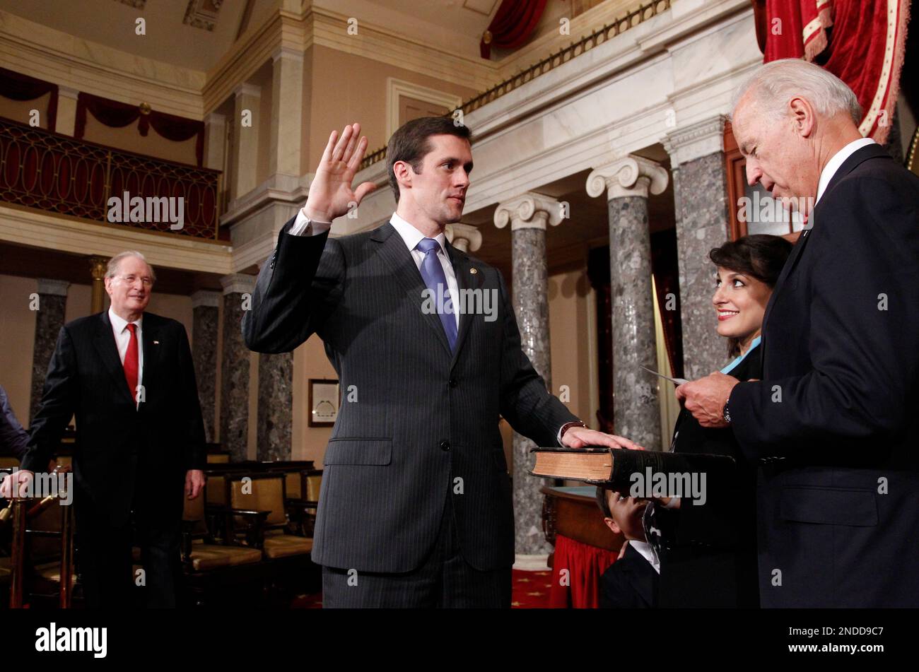 Sen. John D. Rockefeller, D-W.Va., stands left, as Vice President Joe ...