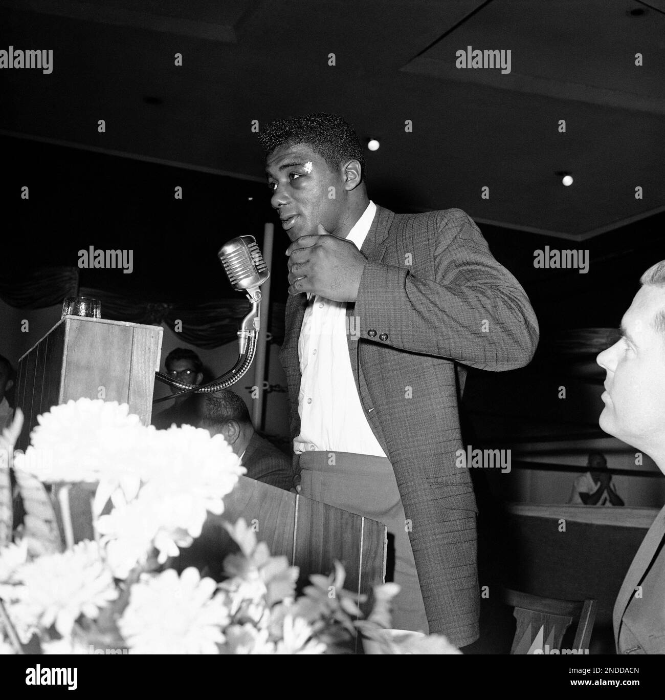 World Heavyweight Champion Floyd Patterson, still wearing a patch over ...