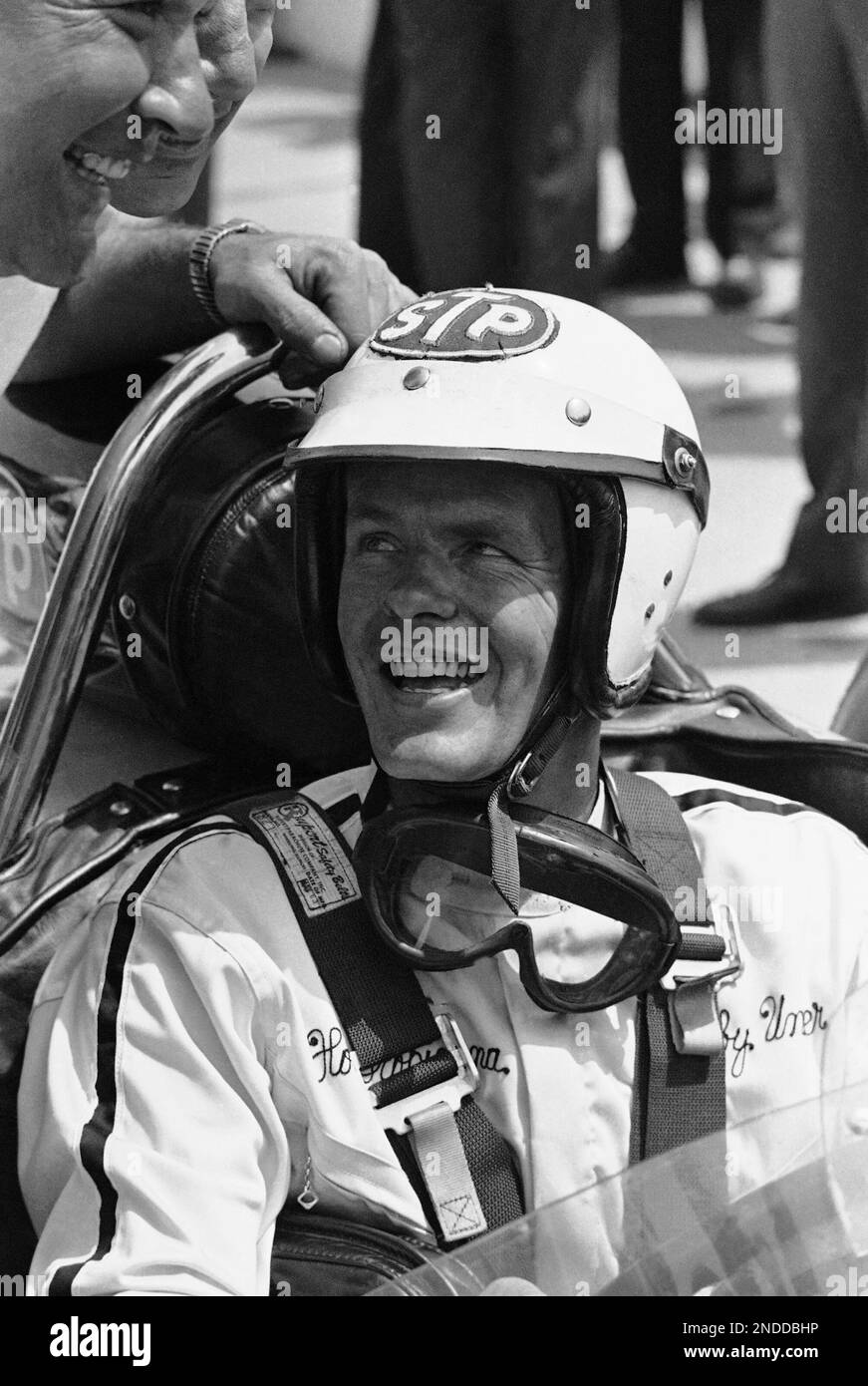 Bobby Unser of Albuquerque, N.M., poses in his car after qualifying for ...