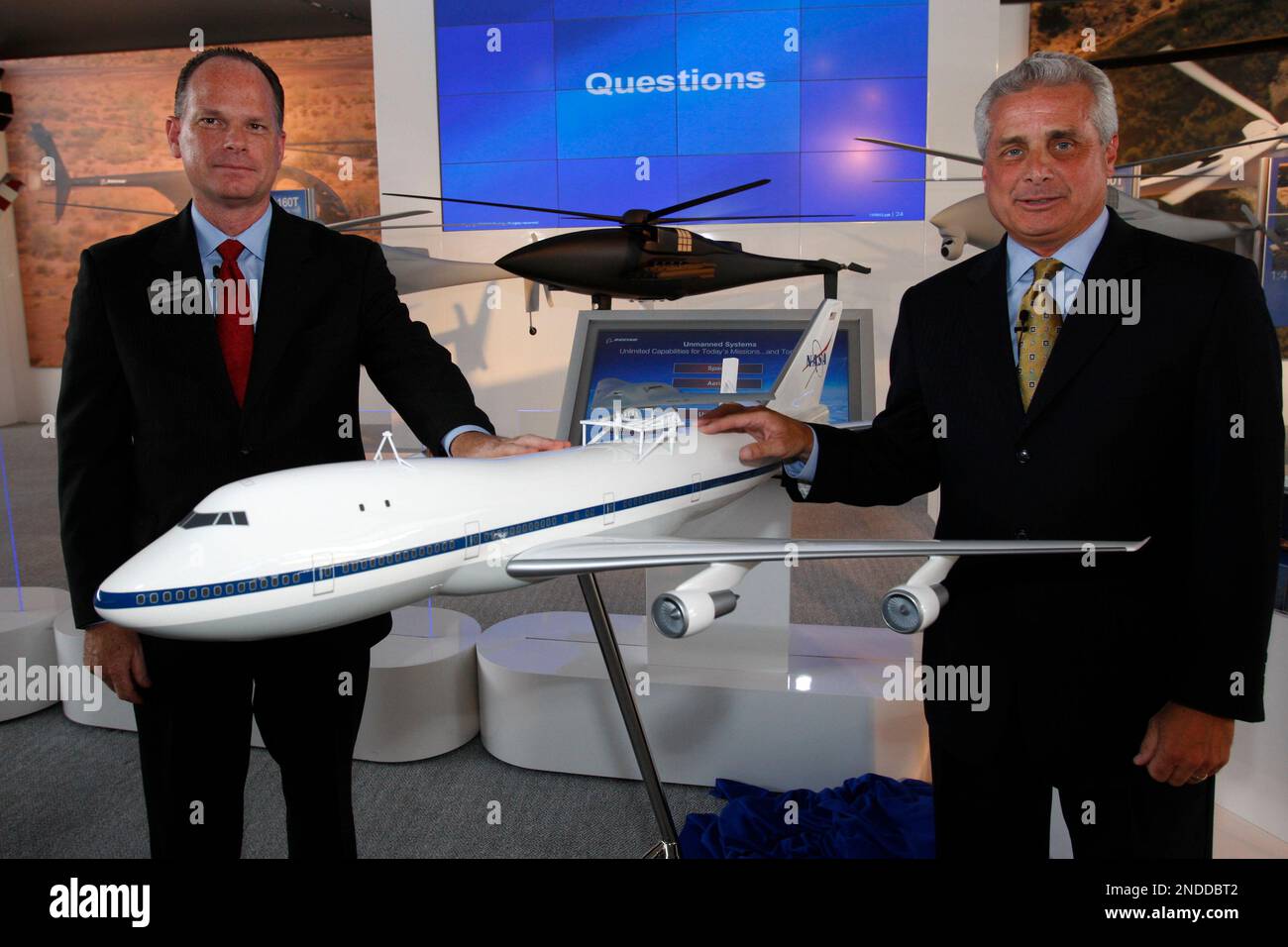 Chris Chadwick, President of Boeing Military Aircrafts, left, and ...