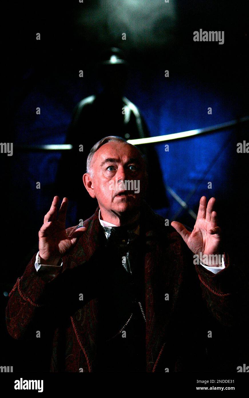 British actor Peter Egan, front, as Holmes and an unnamed actor as ...