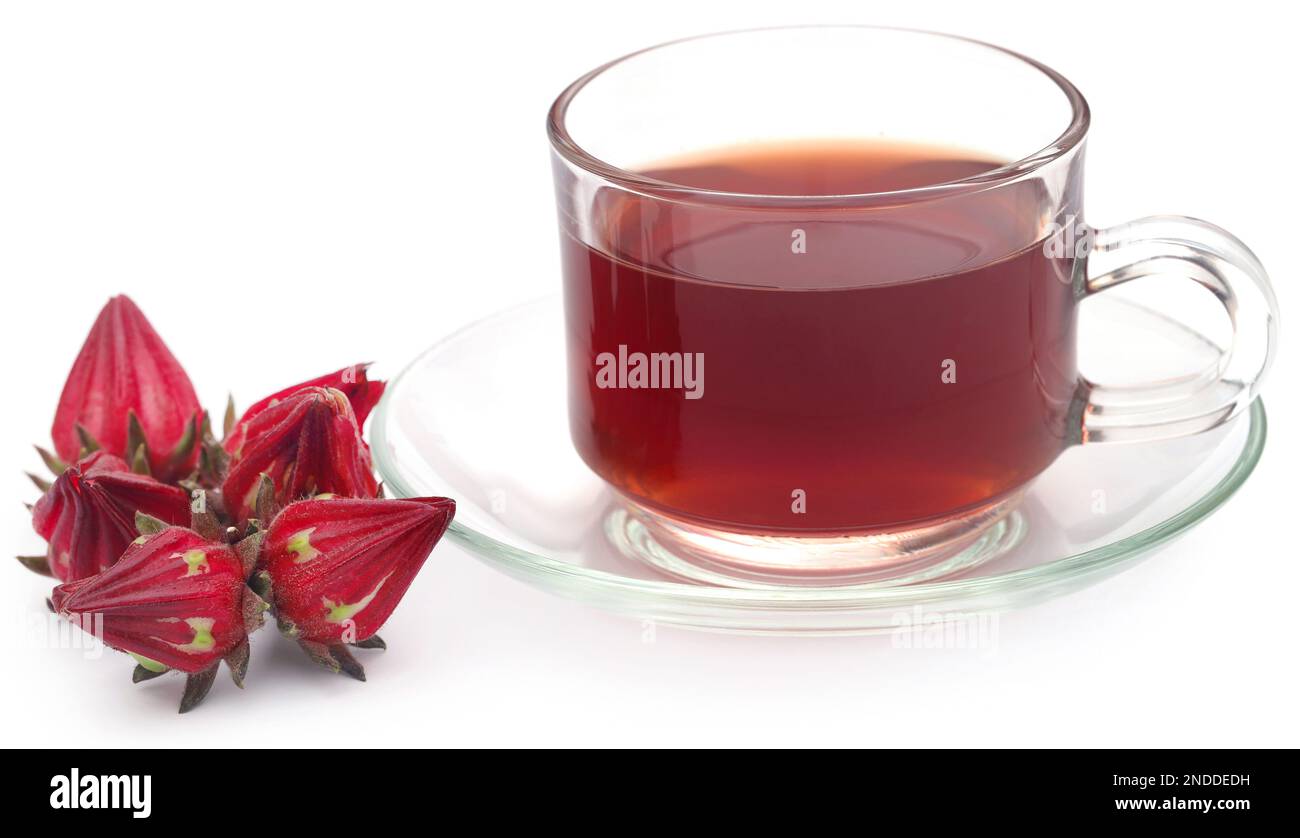 Roselle tea in a cup over white background Stock Photo - Alamy