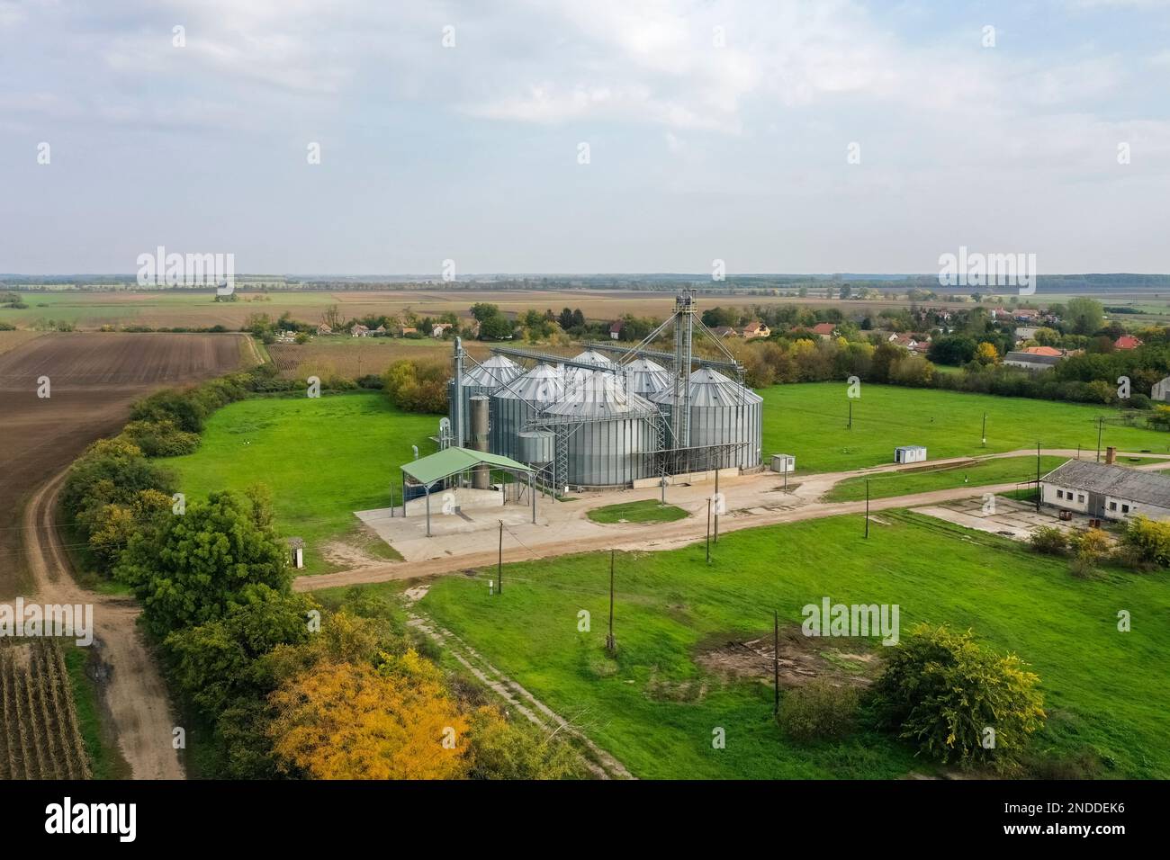 Agricultural silos on the farm in autumn, close-up drone view ...