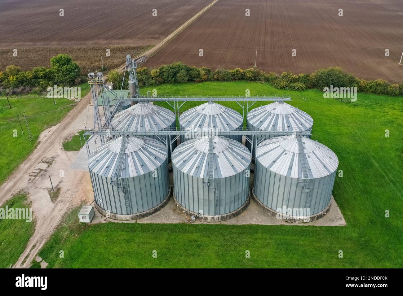 Agricultural silos on the farm in autumn, close-up drone view ...