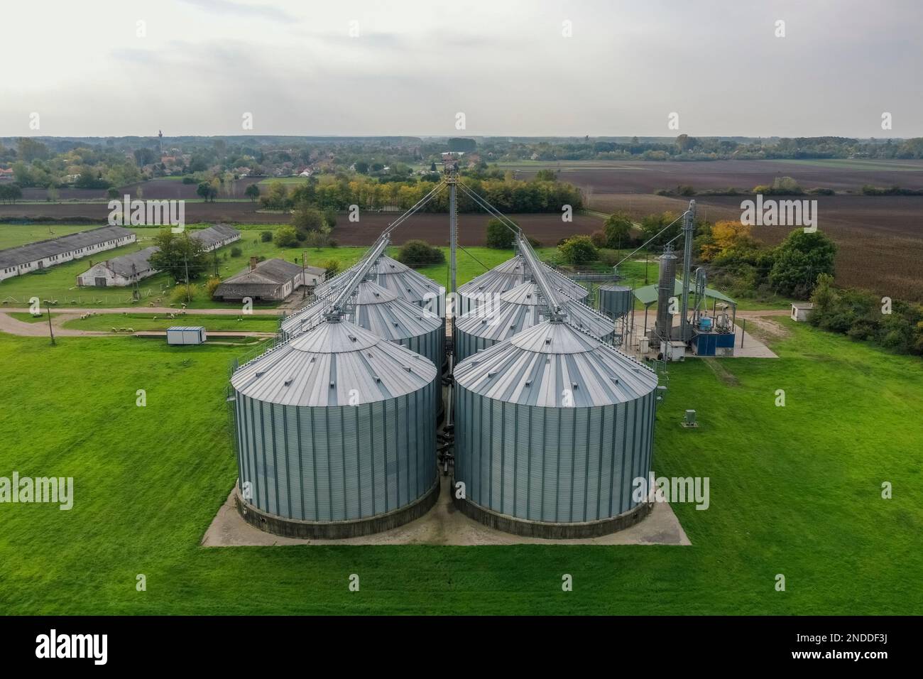 Agricultural silos on the farm in autumn, close-up drone view ...