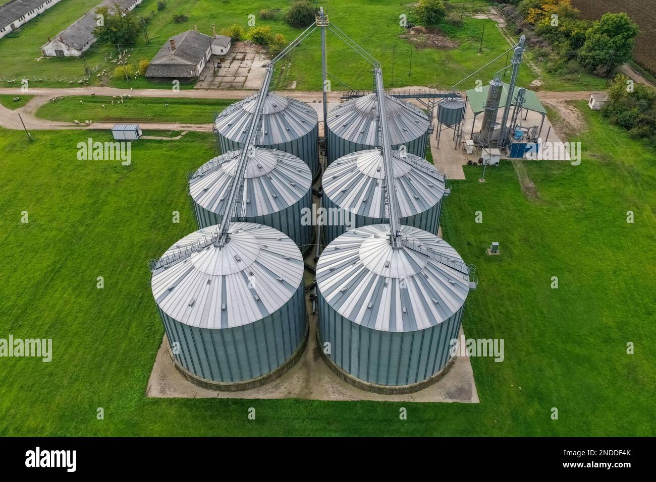 Agricultural silos on the farm in autumn, close-up drone view ...