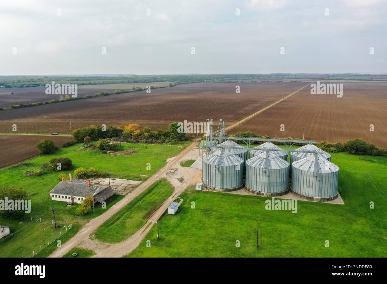 Agricultural silos on the farm in autumn, close-up drone view ...