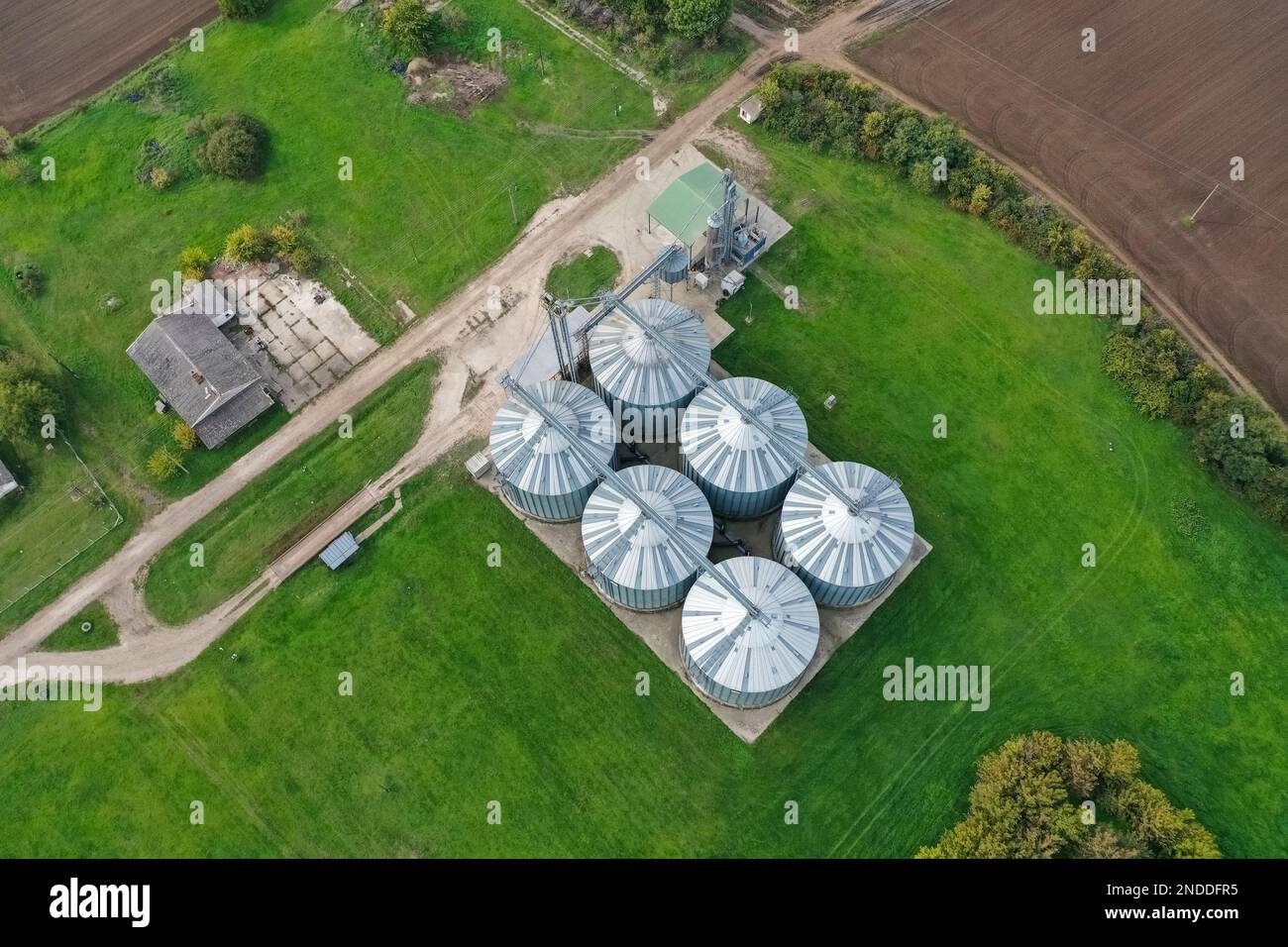 Agricultural silos on the farm in autumn, close-up drone view ...