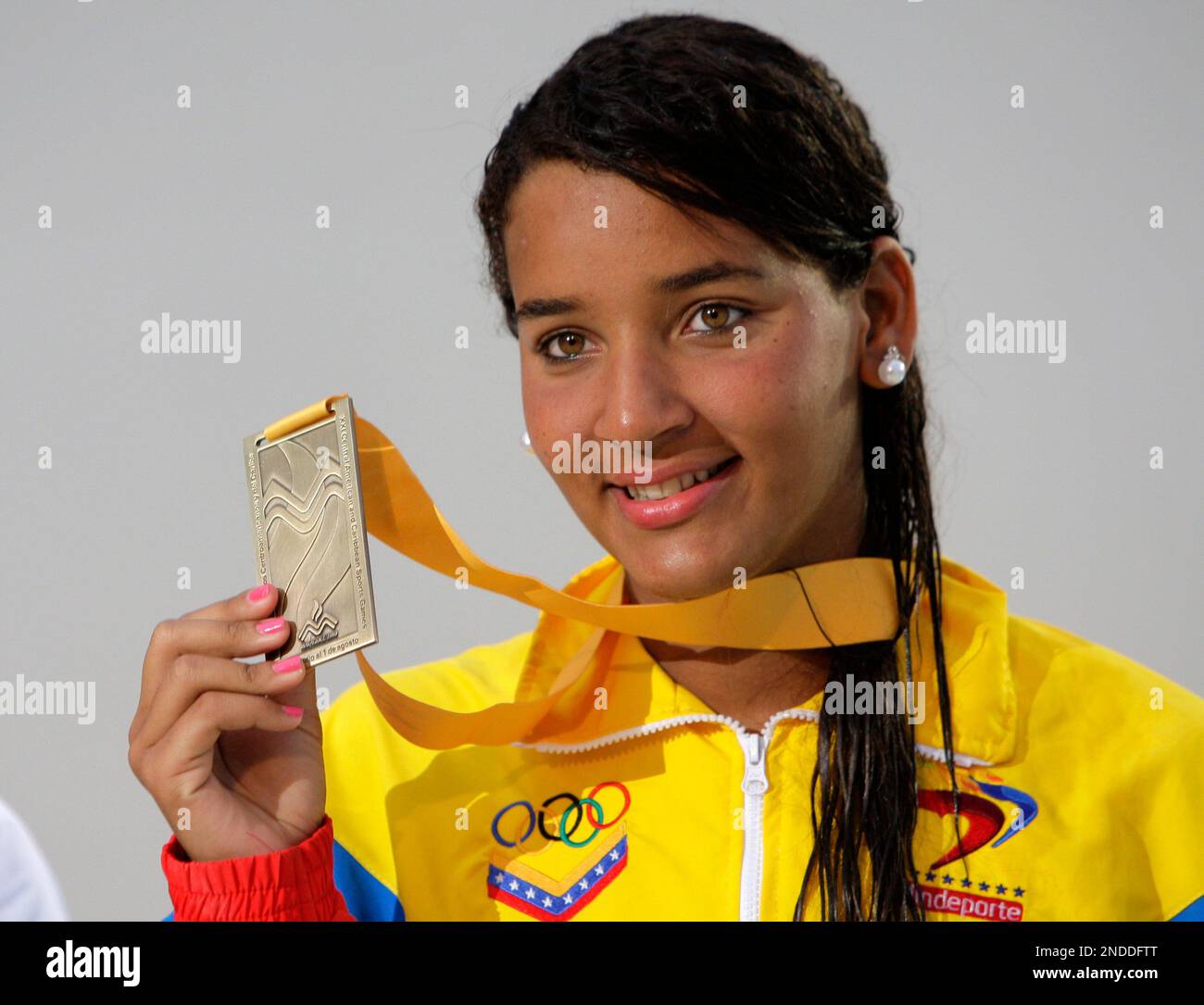 Venezuela's Andreina Pinto poses with her gold medal after wining the ...