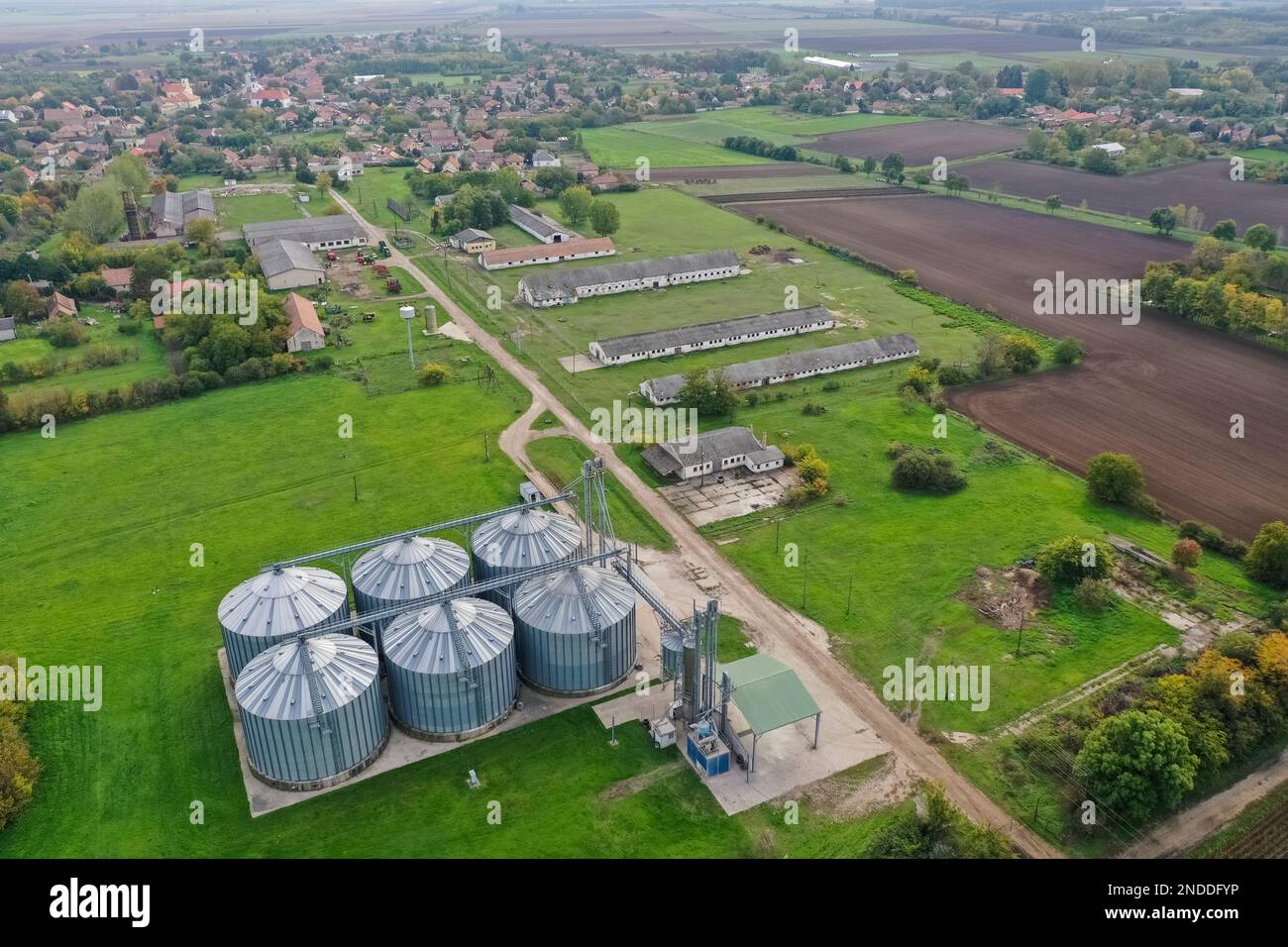 Agricultural silos on the farm in autumn, close-up drone view ...