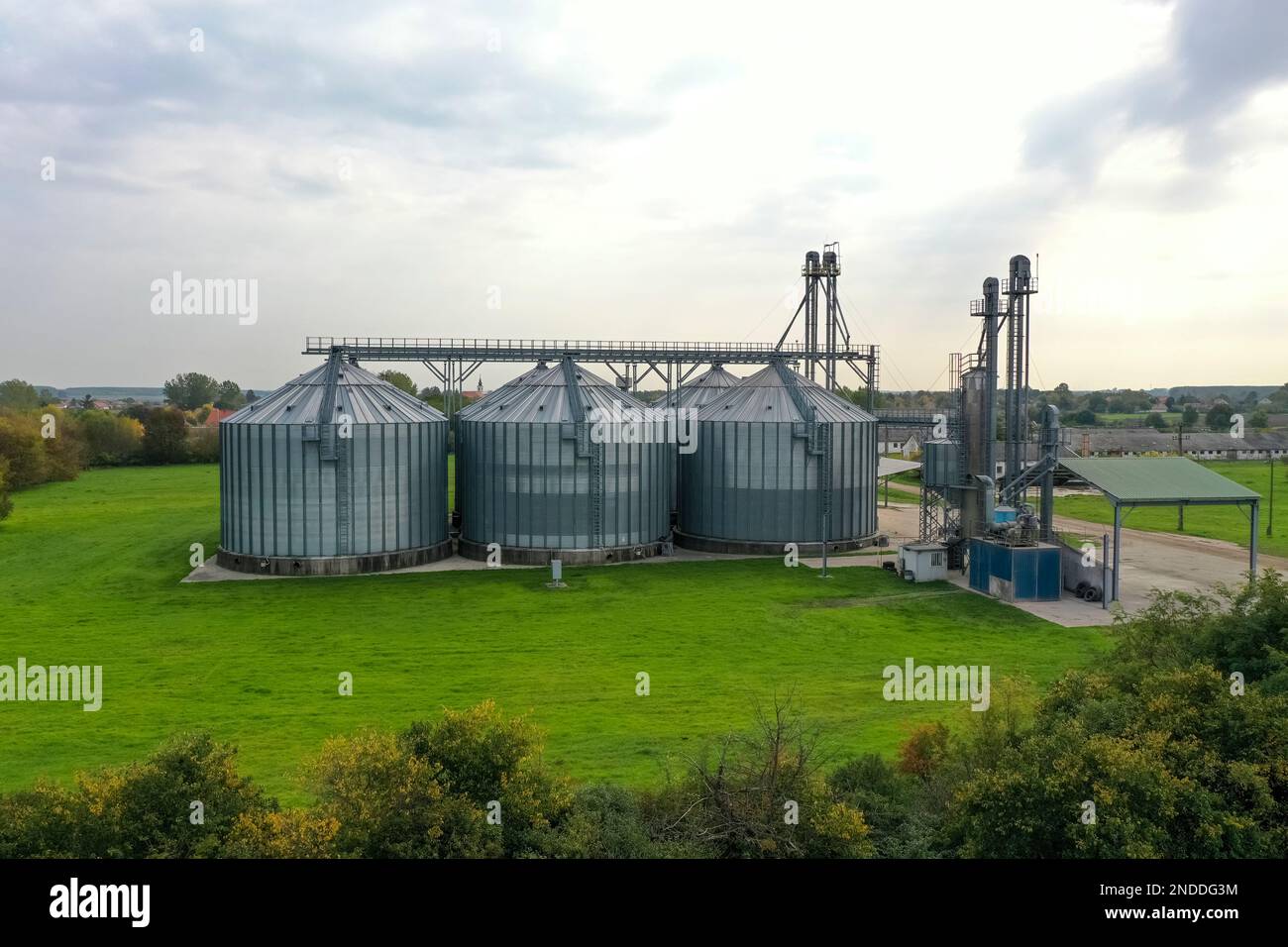 Agricultural silos on the farm in autumn, close-up drone view ...