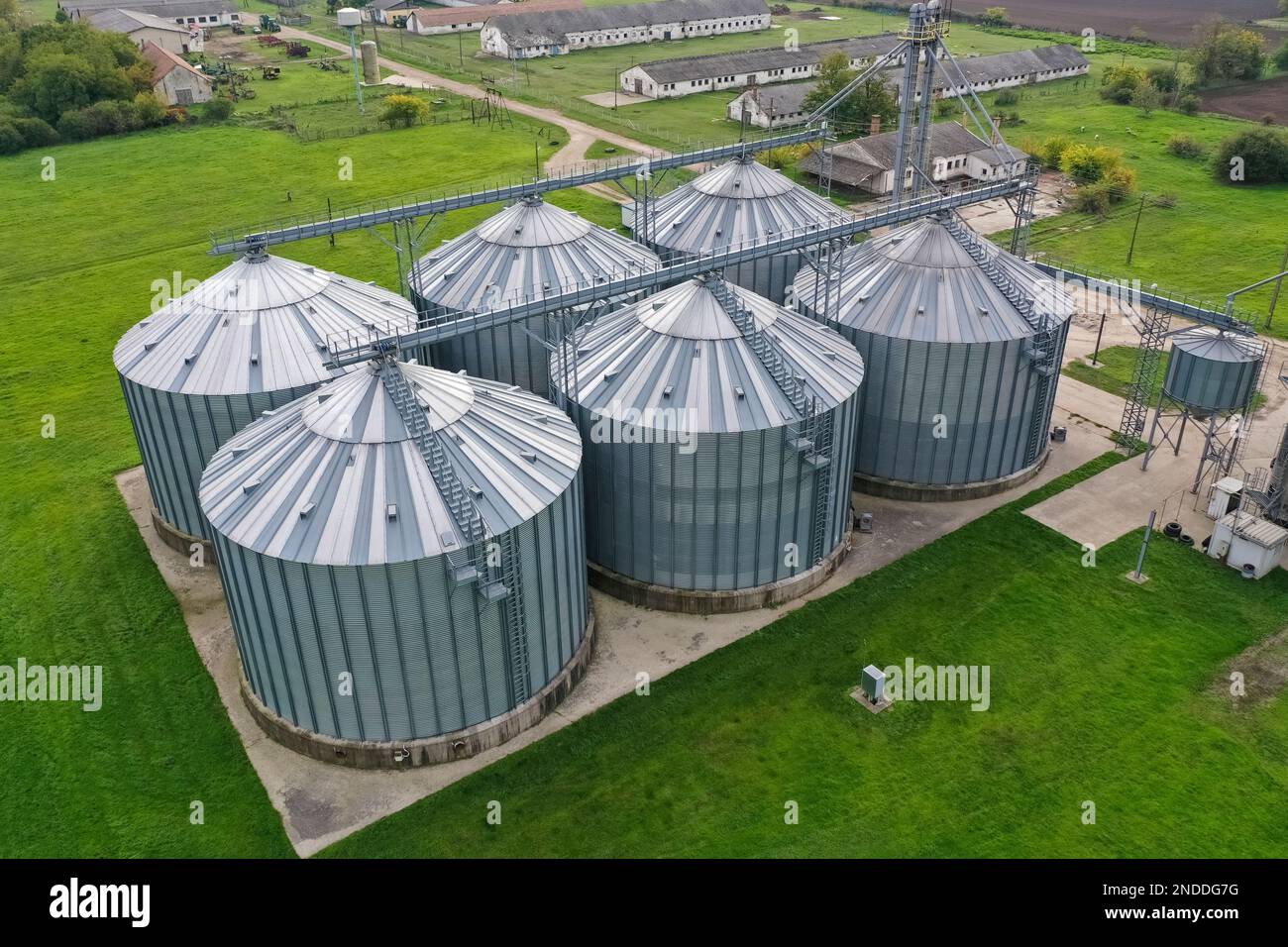 Agricultural silos on the farm in autumn, close-up drone view ...