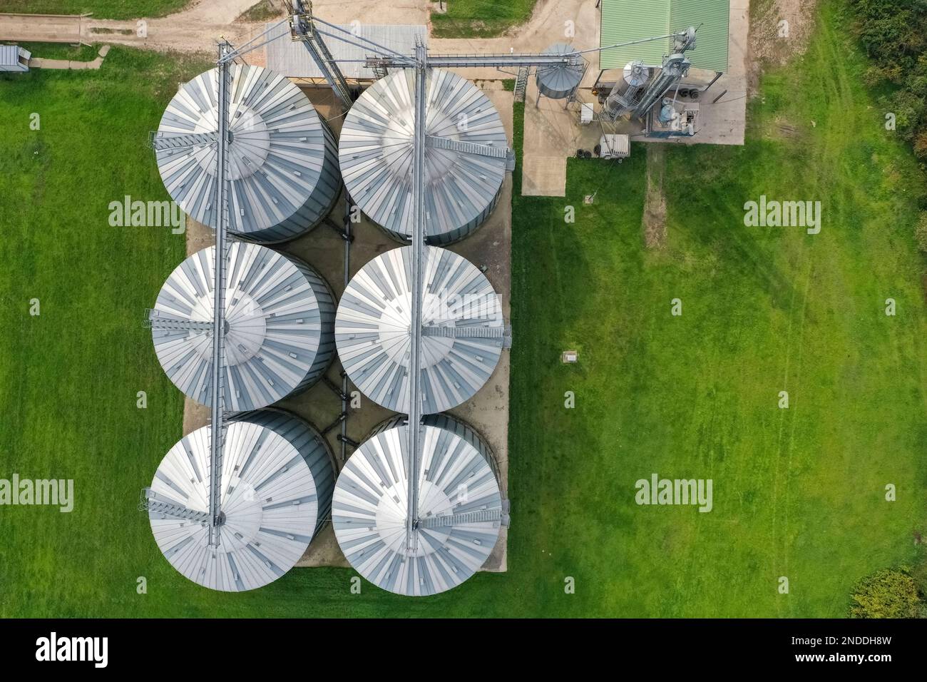 Agricultural silos on the farm in autumn, close-up drone view ...