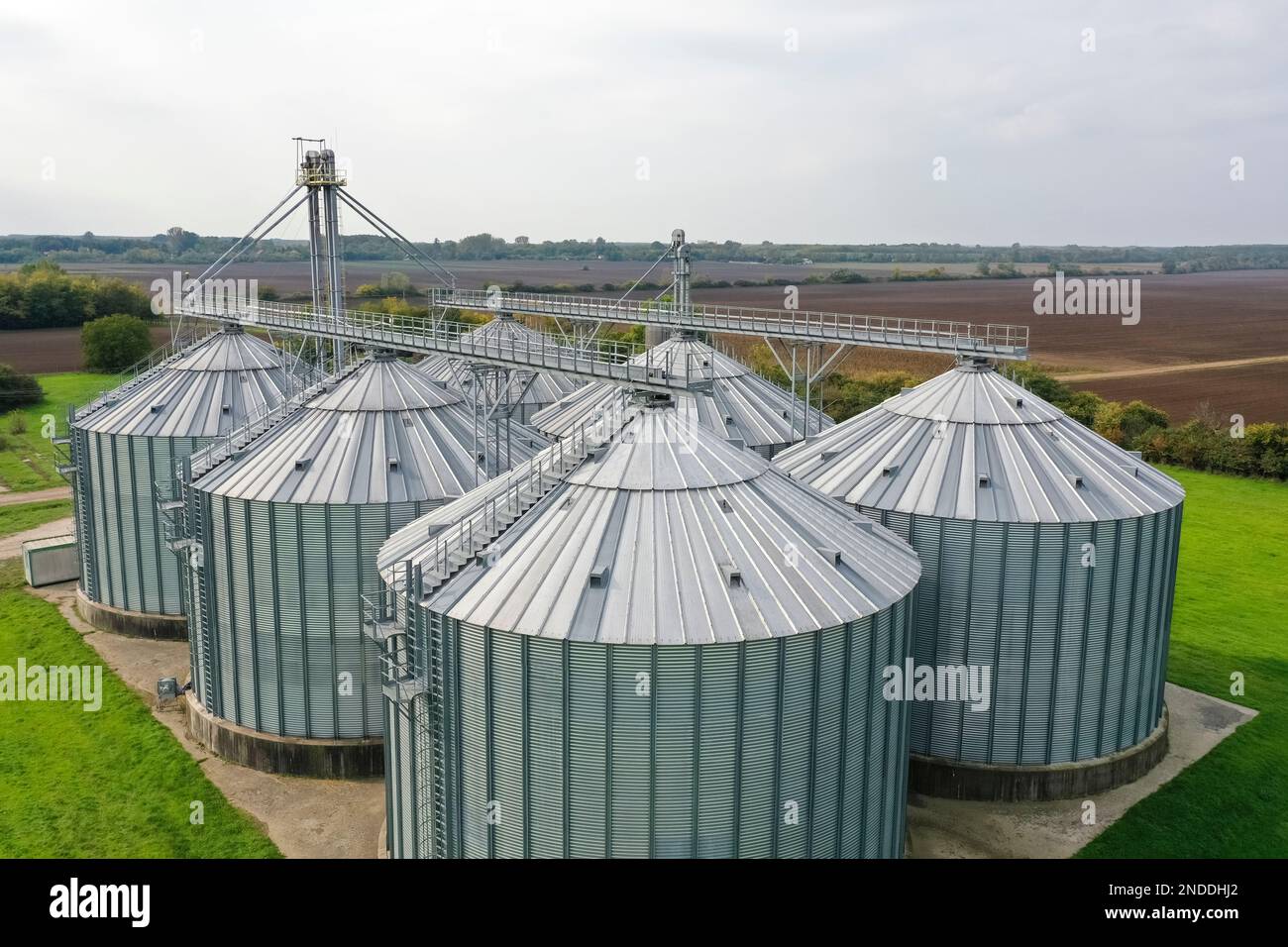 Agricultural silos on the farm in autumn, close-up drone view ...