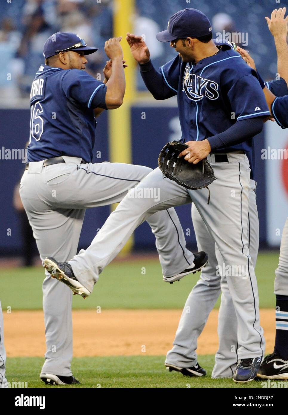 Tampa Bay Rays' Willy Aybar, left, and Carlos Pena celebrate after the ...
