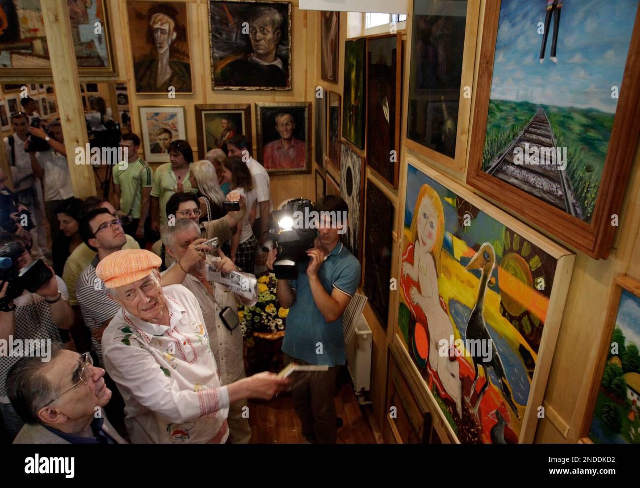 Russian poet Yegeny Yevtushenko, second left, seen at the opening of ...