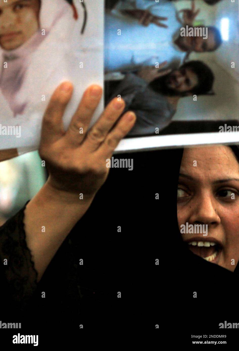 A Bahraini woman chants Friday, July 16, 2010, during a protest in Ma ...