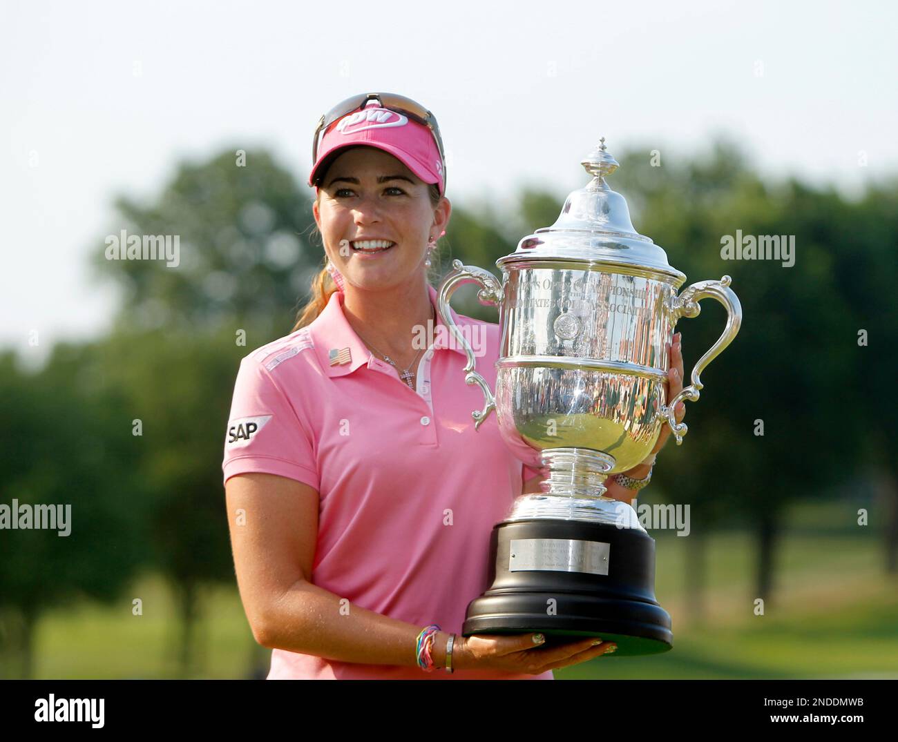 Paula Creamer holds the trophy after winning the U.S. Women's Open golf ...
