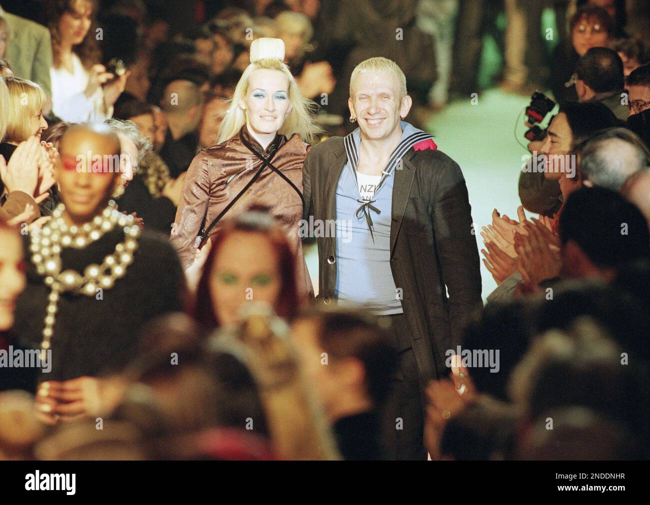 French fashion designer Jean Paul Gaultier, surrounded by models ...