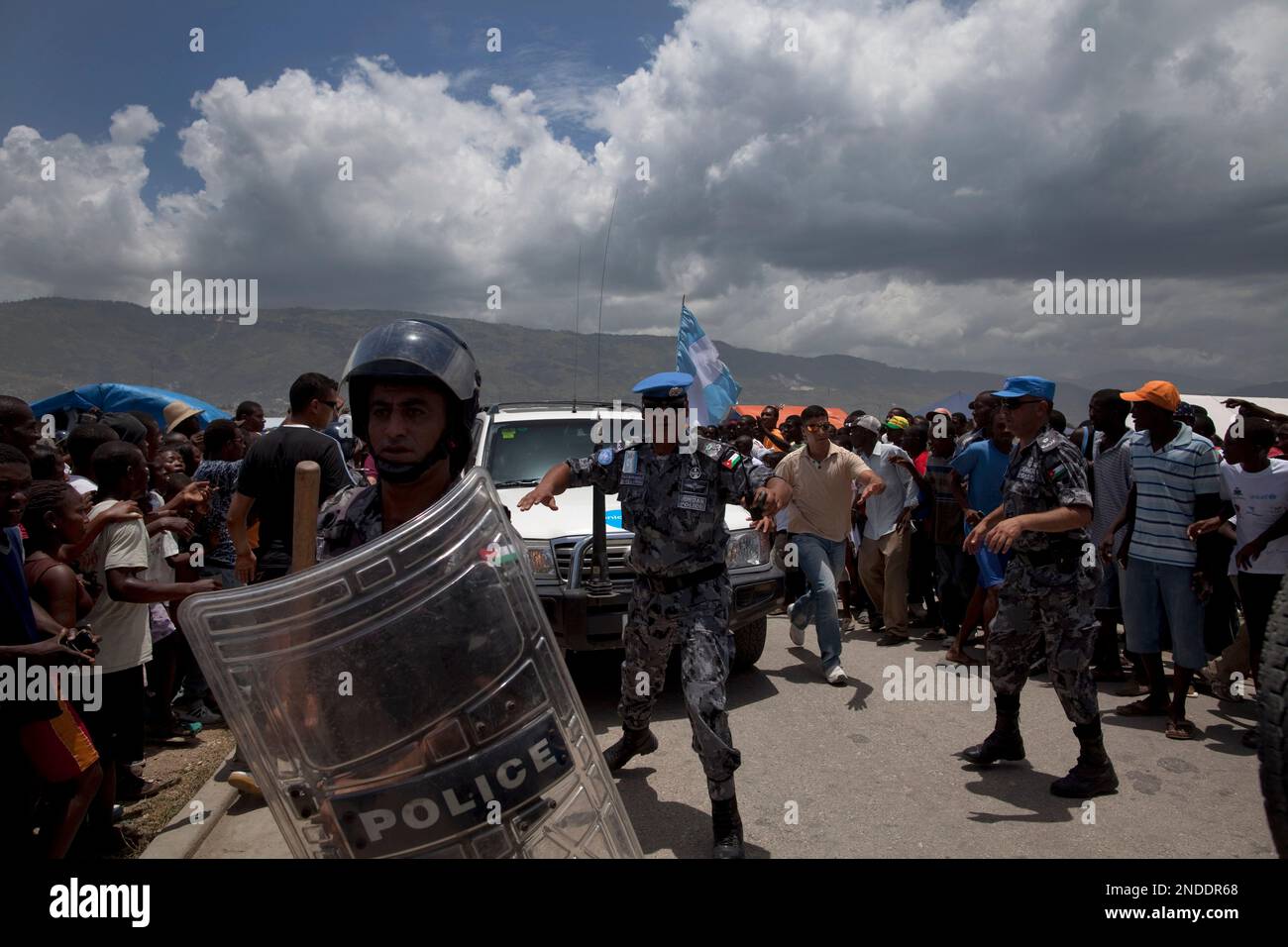 Jordanian peacekeepers protect the car of Argentine soccer star and ...