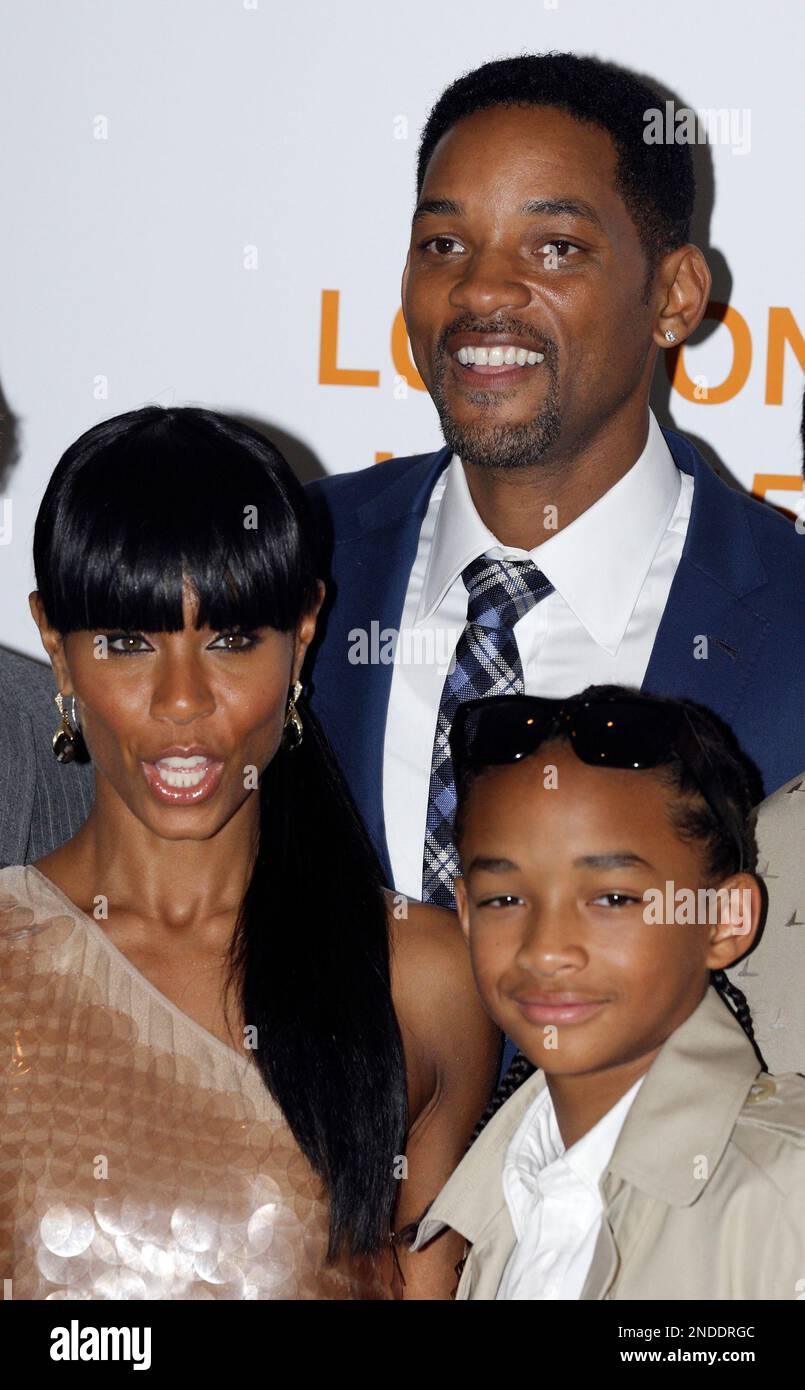 Cast members Jaden Smith, bottom right, poses for photographs with his ...